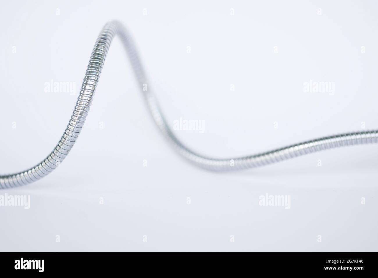 metal power cable for background Stock Photo - Alamy