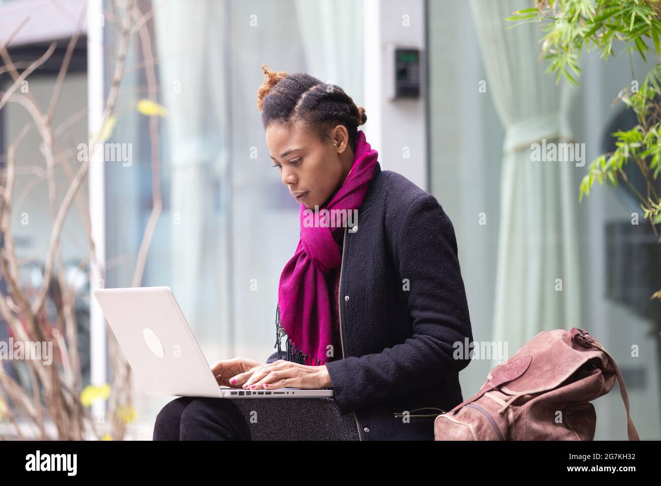 Black women working with computers on the street Stock Photo - Alamy