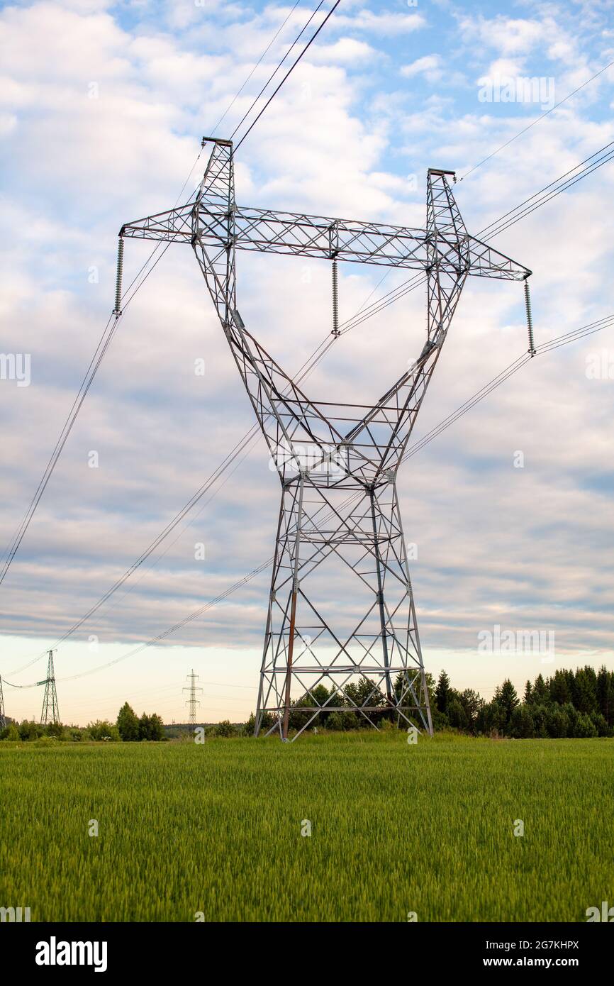 Metal poles electric supports for high-voltage wires in the fields in ...