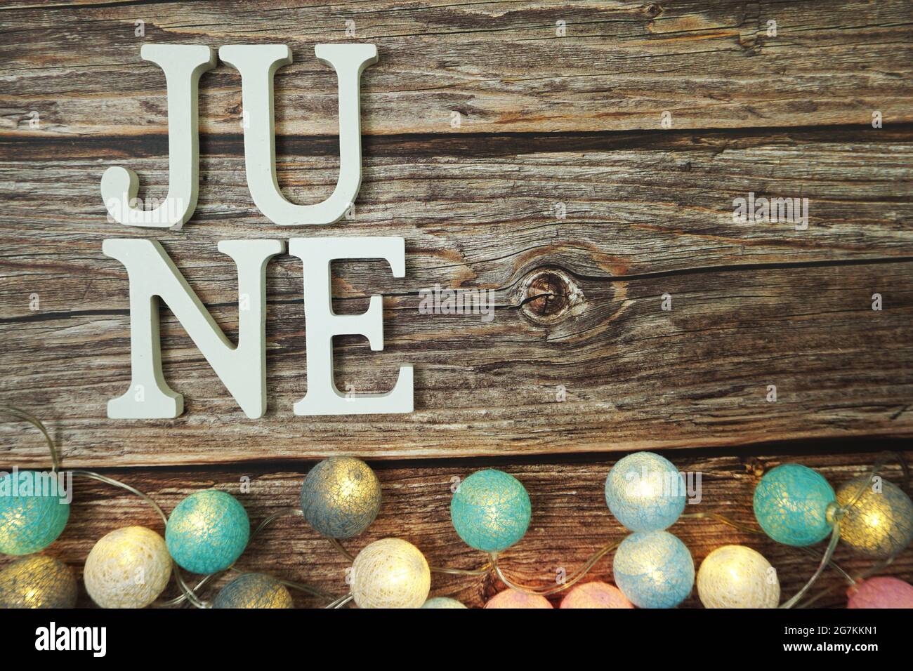 June alphabet letter with LED Cotton ball Decoration on wooden ...