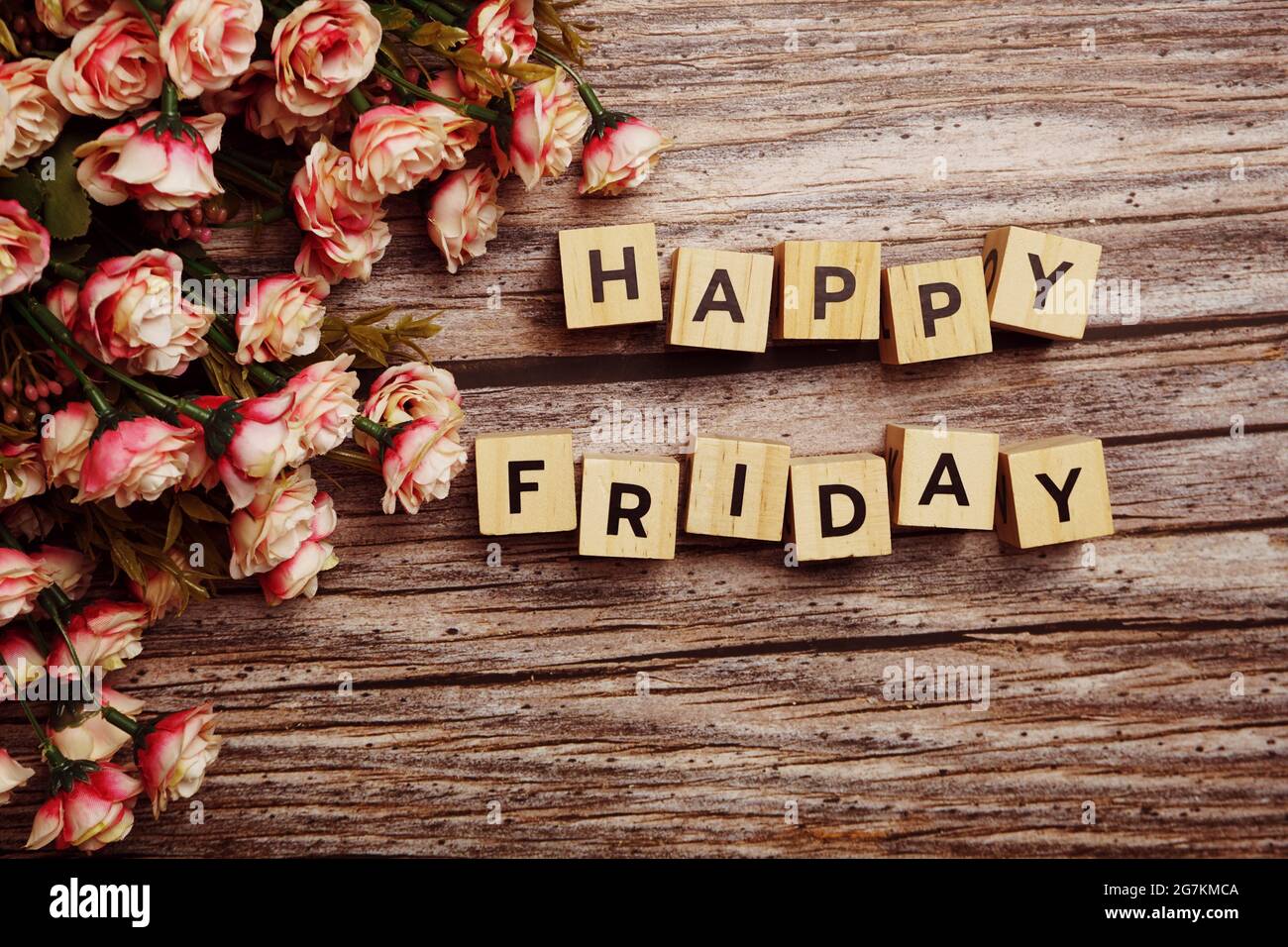 Happy Friday alphabet letters with flower decoration on wooden ...