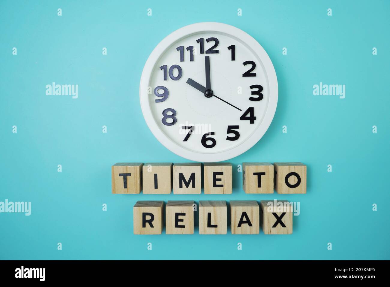 Time To Relax alphabet letter with alarm clock on blue background Stock ...
