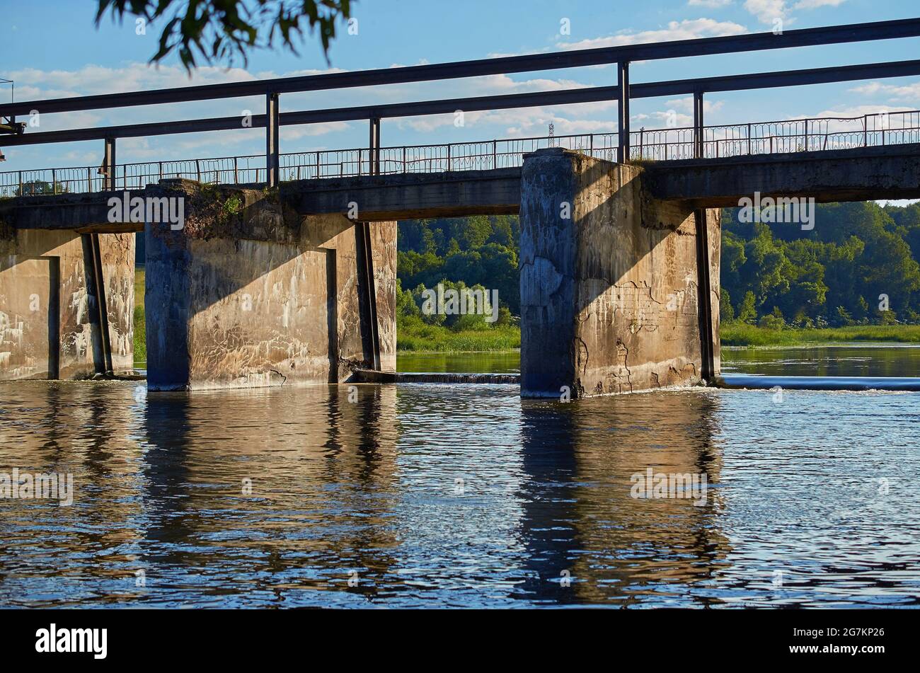 Pedestrian bridge across the river to the old hydroelectric power ...