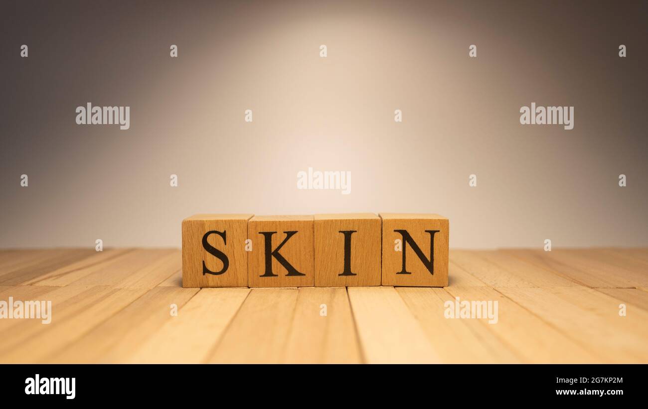 The word skin was created from wooden letter cubes. Disease and health ...