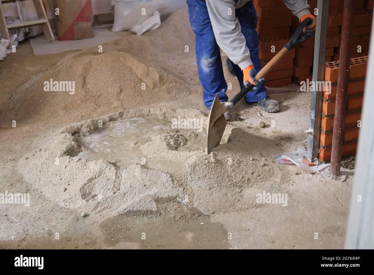 Construction worker preparing cement. Man bricklaying. Mason laying ...