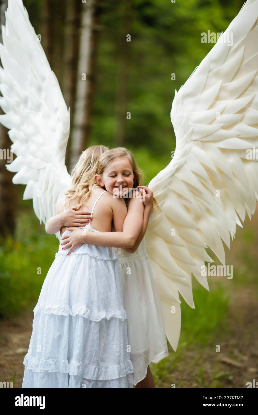 Girl in angel wings face hi-res stock photography and images - Alamy
