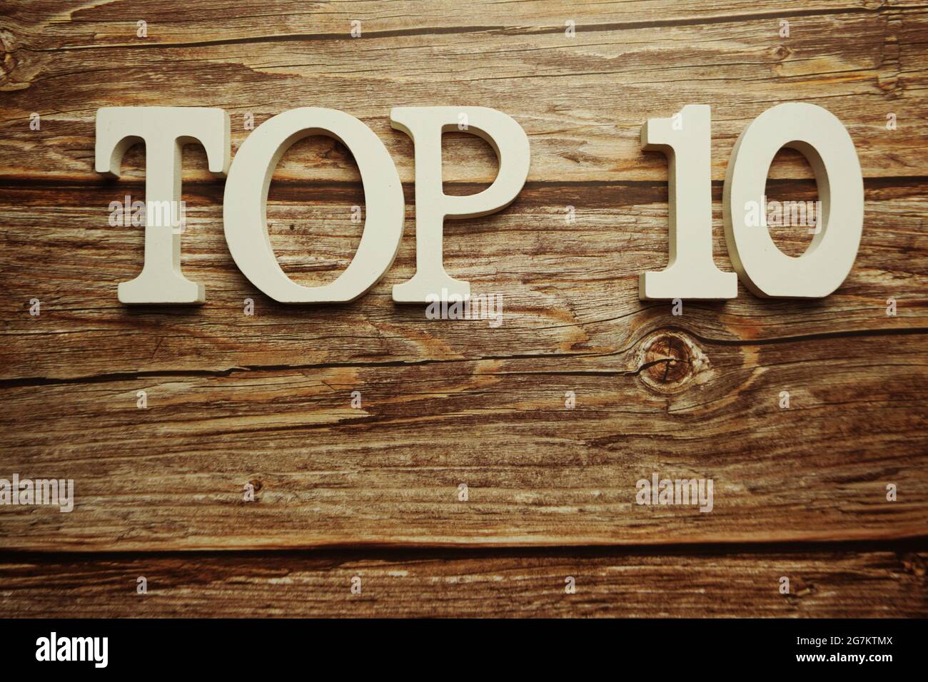Top 10 alphabet letters with space for copy on wooden background Stock ...
