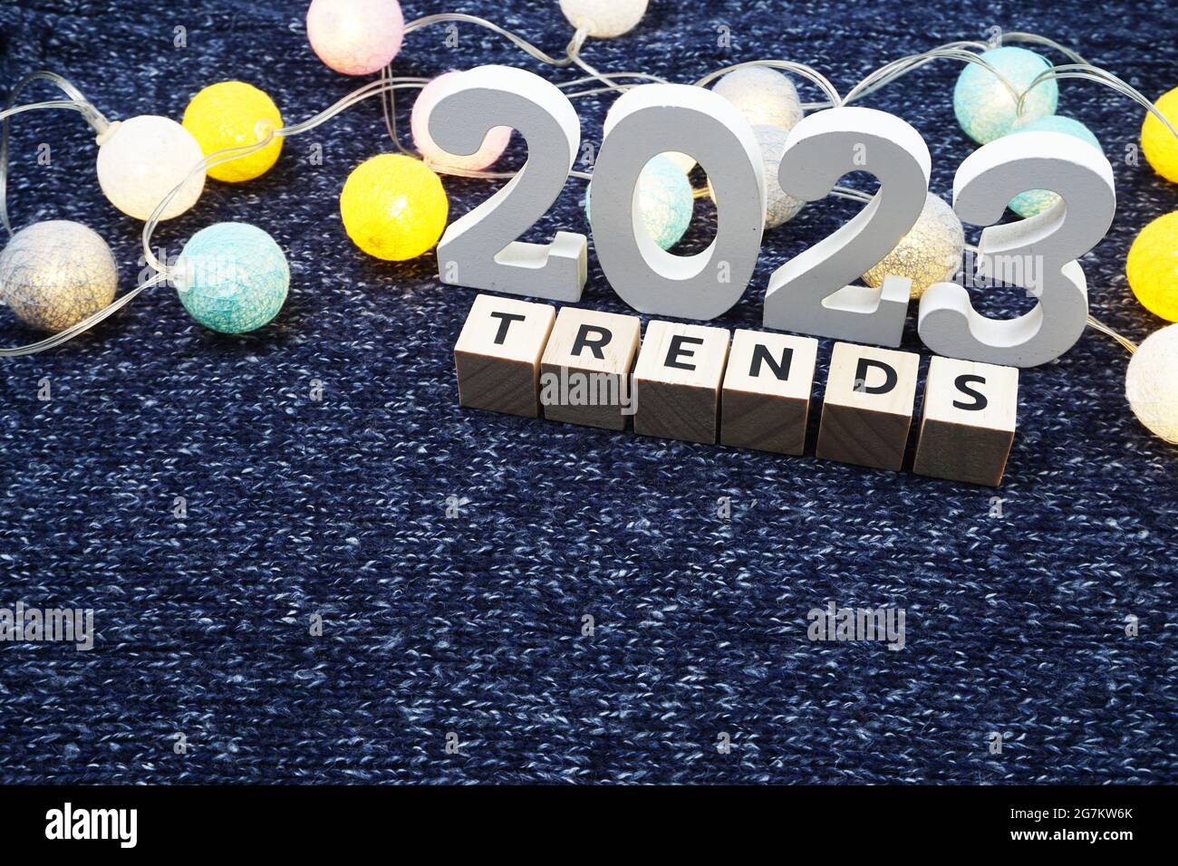 Trends 2023 alphabet letter with LED cotton ball on blue knitted fabric ...
