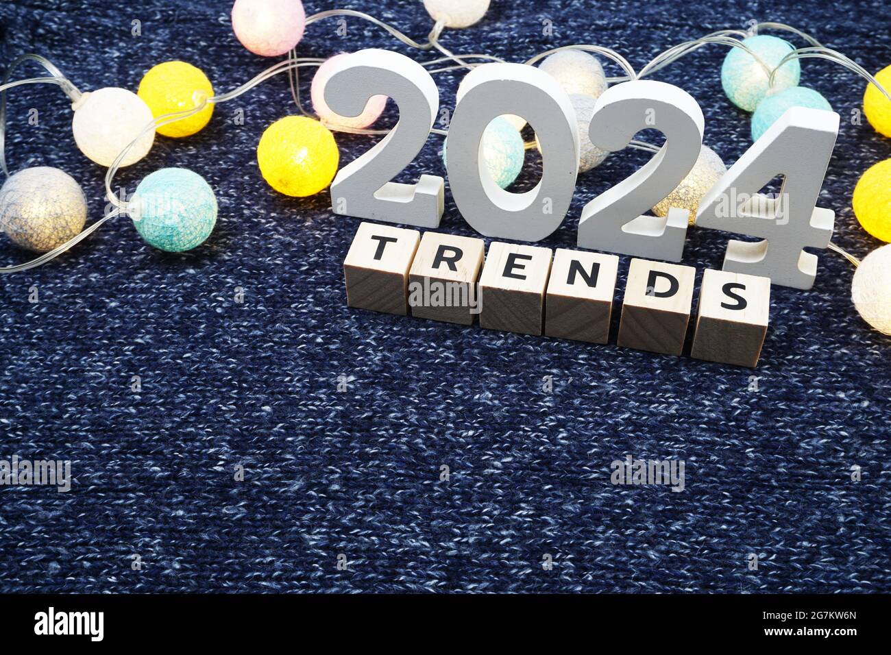Trends 2024 alphabet letter with LED cotton ball on blue knitted fabric ...