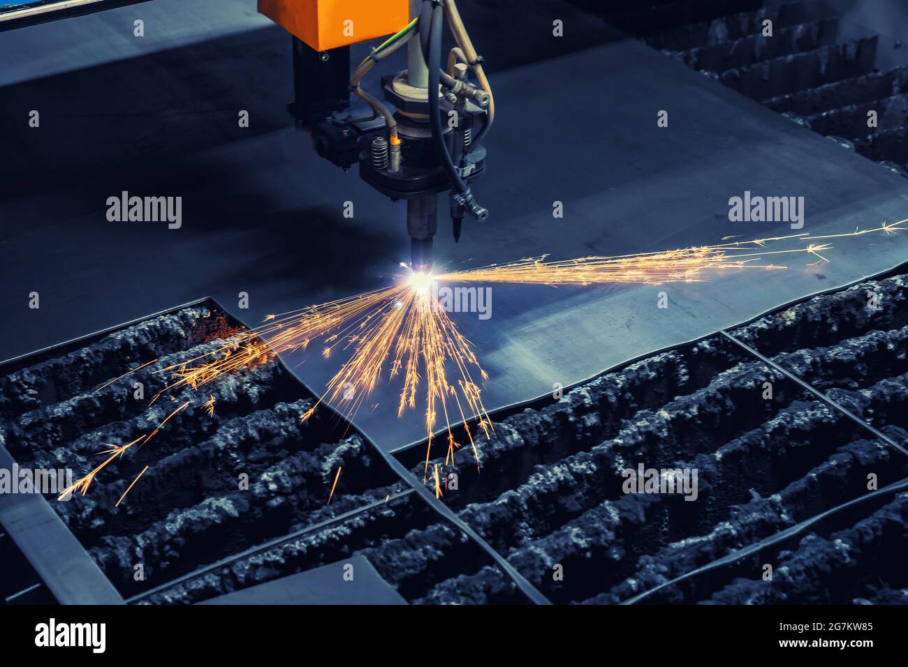 Concept industry background, blue color. Closeup plasma cutting CNC ...