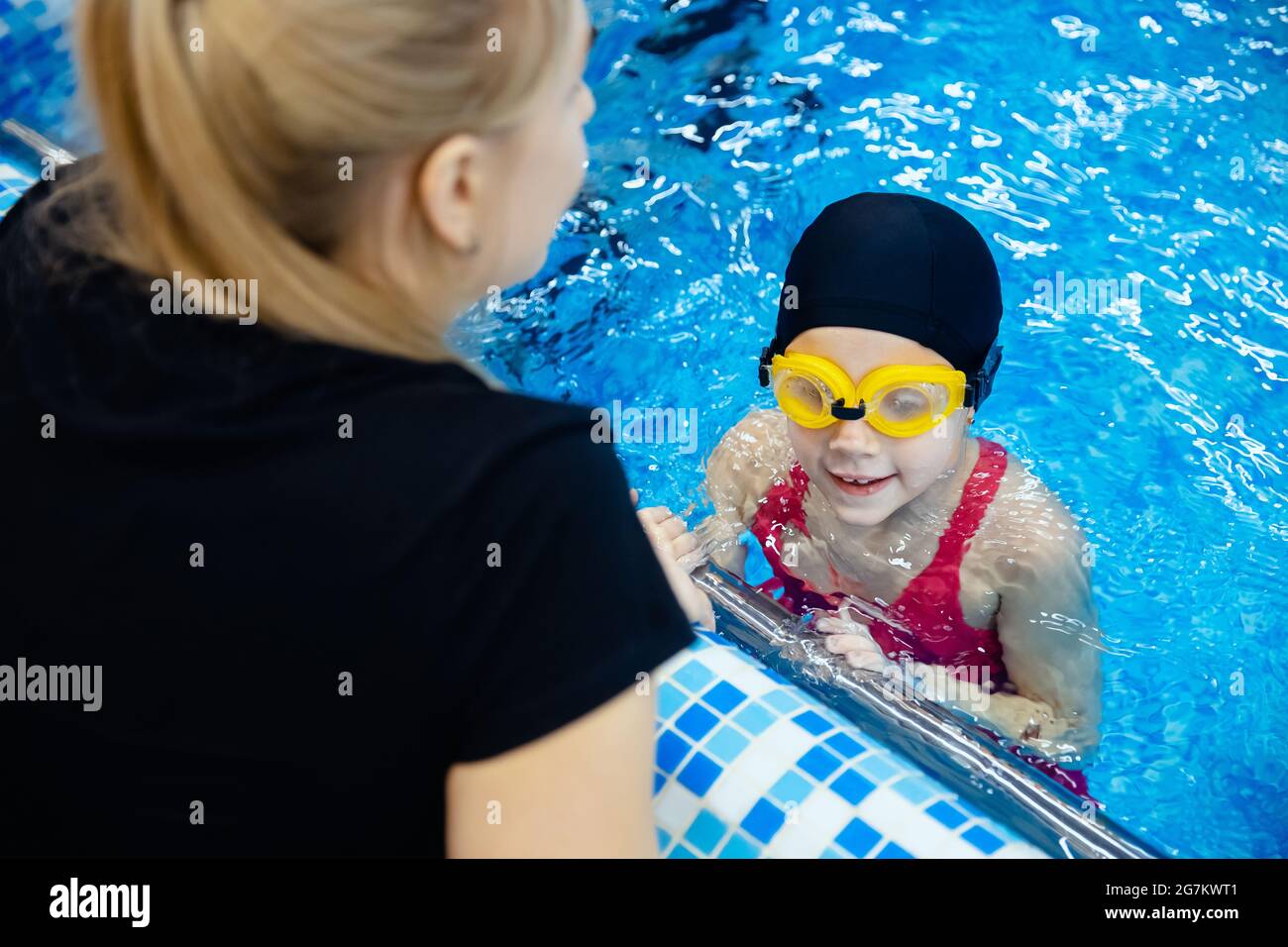 Female coach with swim team hi-res stock photography and images - Alamy