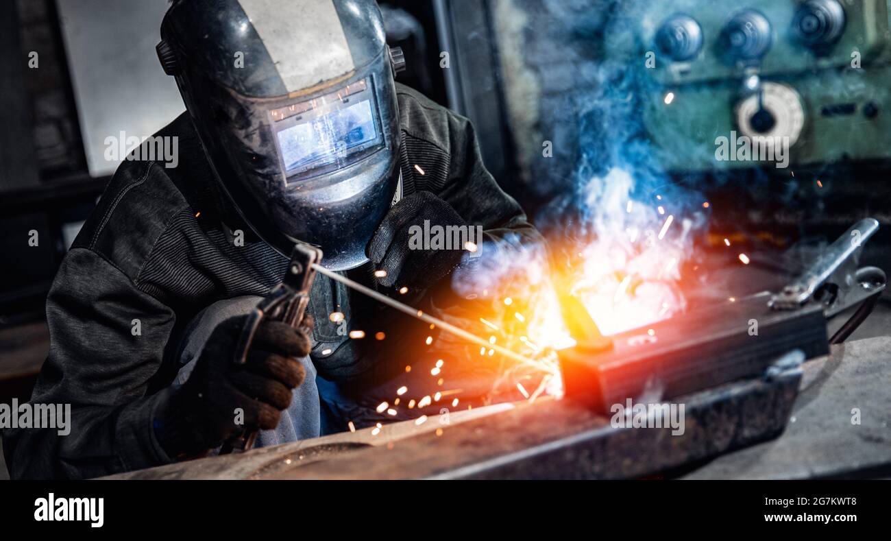 Industry worker banner, professional welder in protect mask use ...