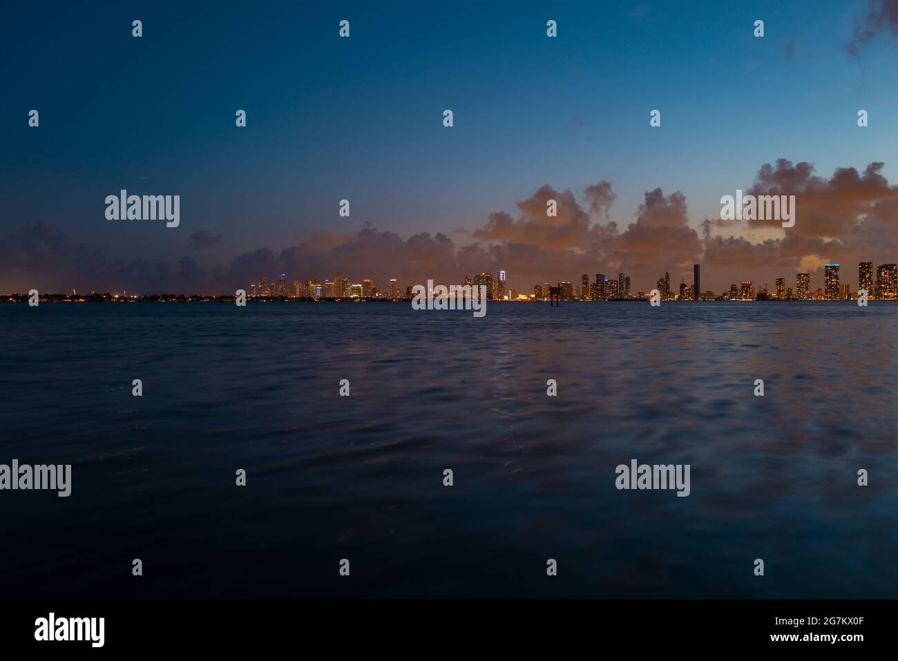 Miami at sunset. Miami Florida, colorful skyline of Macarthur causeway ...