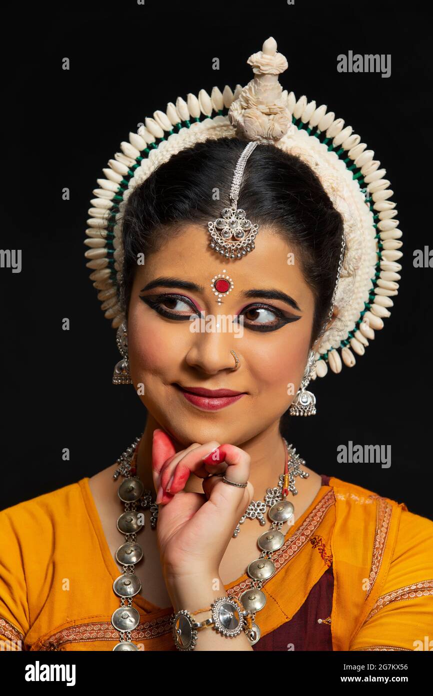 Odissi dancer striking a pose Stock Photo - Alamy