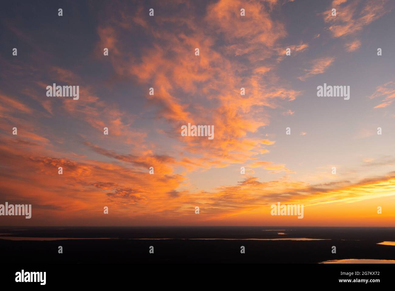 Aerial view of a sunset sky background. Aerial Dramatic gold sunset sky ...