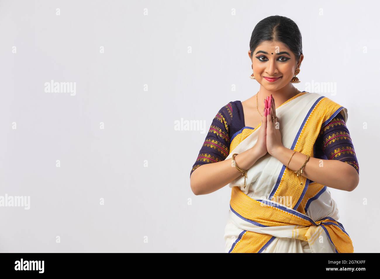 Mohiniattam dancer in Anjali mudra greeting with a smile Stock Photo ...