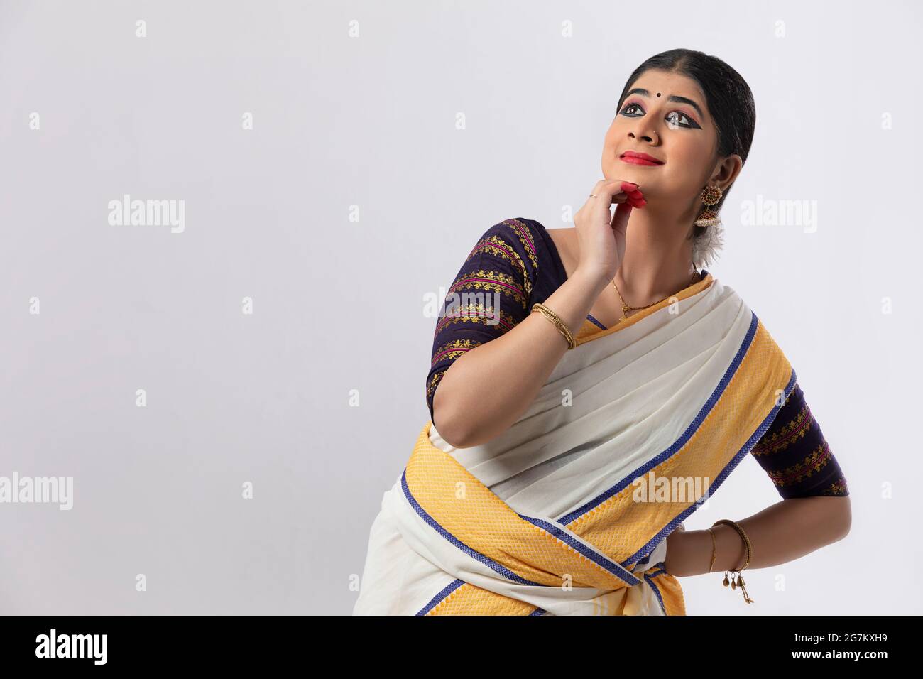 Indian classical dancer looking in amazement with Mushti mudra Stock ...