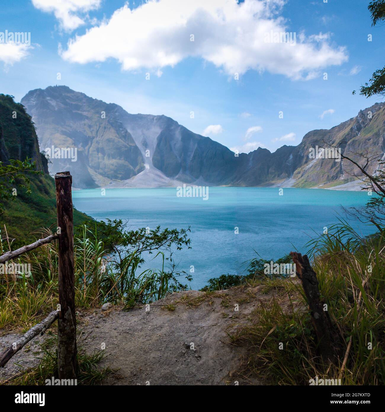 Vertical shot of the Lake Pinatubo surrounded by the Zambales Mountains ...
