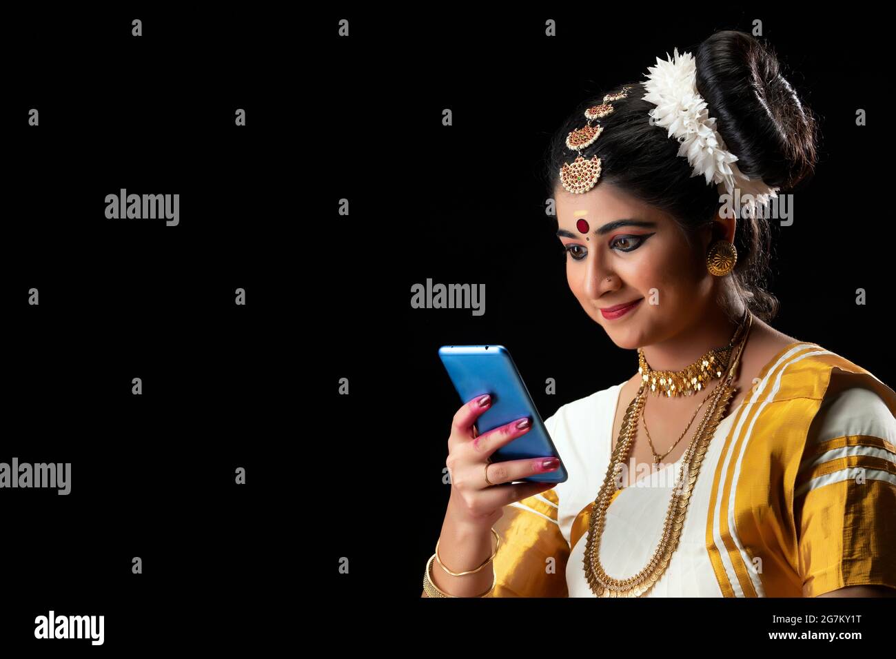 Smiling while texting hi-res stock photography and images - Alamy