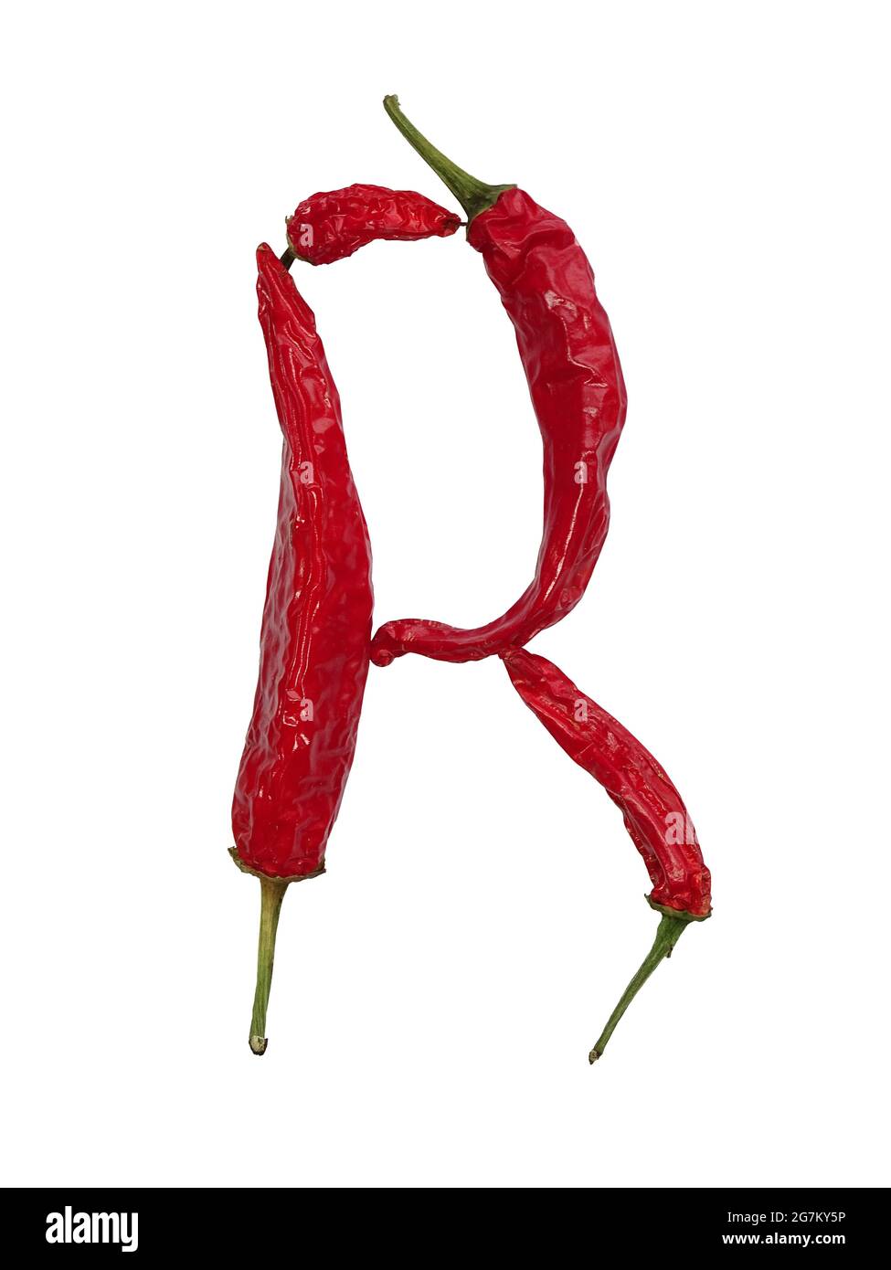 Letter R of the alphabet made with red pepper, isolated on a white ...
