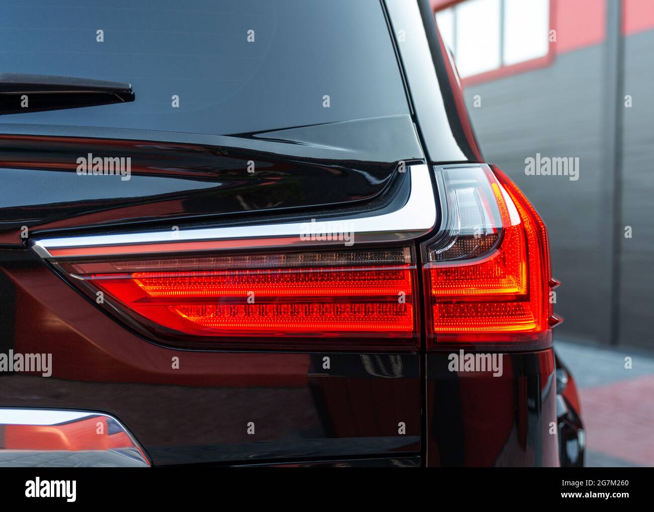 Rear stop light of large suv car. Black premium city crossover Stock ...