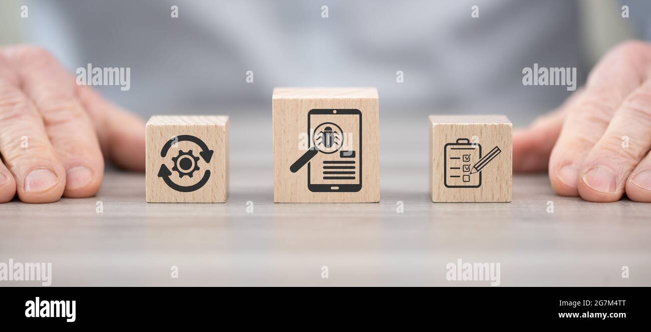 Wooden blocks with symbol of software testing concept Stock Photo - Alamy