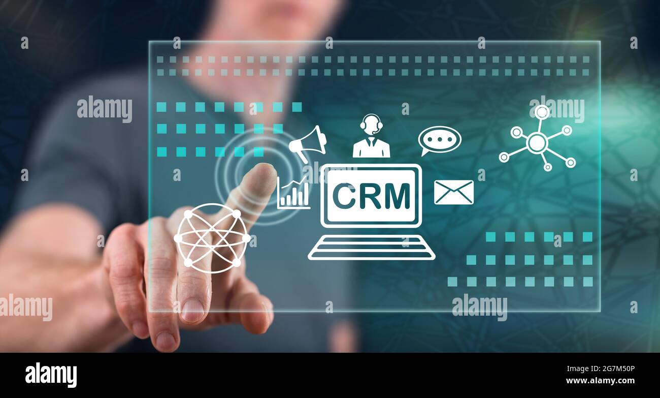 Man touching a crm concept on a touch screen with his finger Stock ...