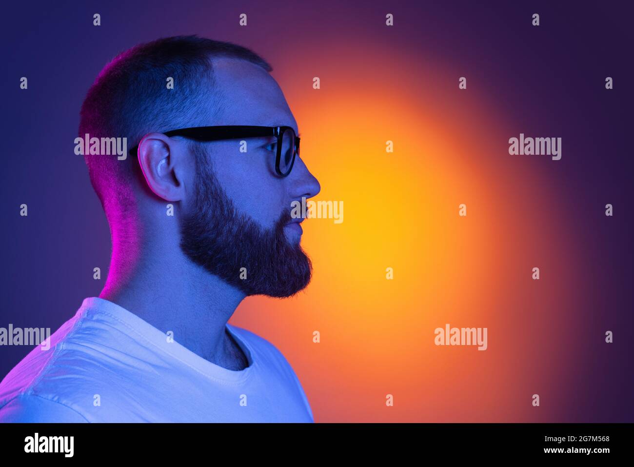 Side view image of calm handsome caucasian man isolated on purple ...