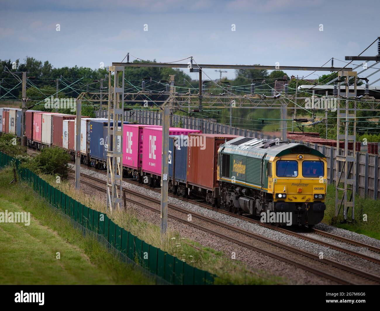 Approaching blue diesel train hi-res stock photography and images - Alamy