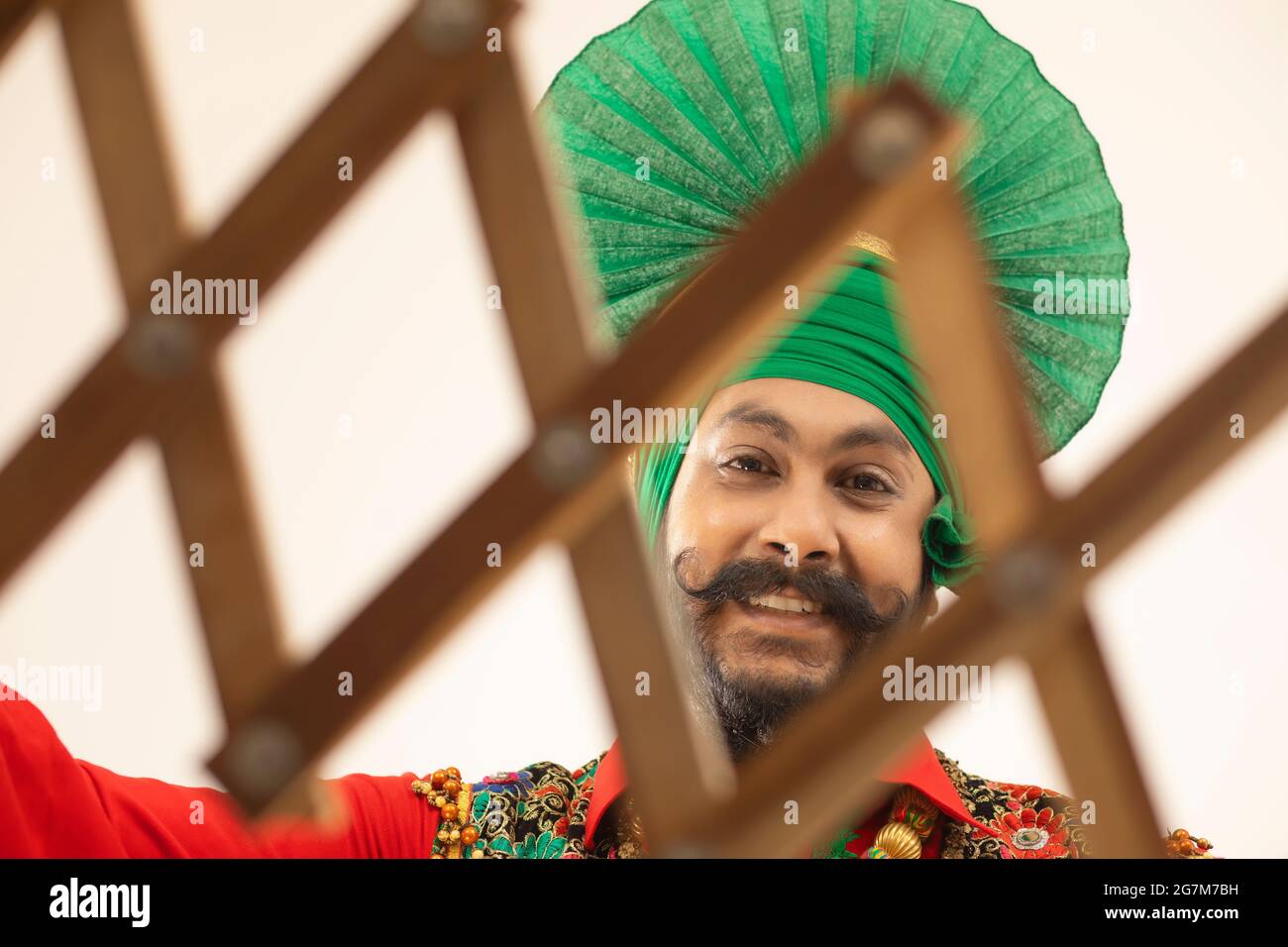 A Bhangra Dancer's face through the Saap Stock Photo - Alamy