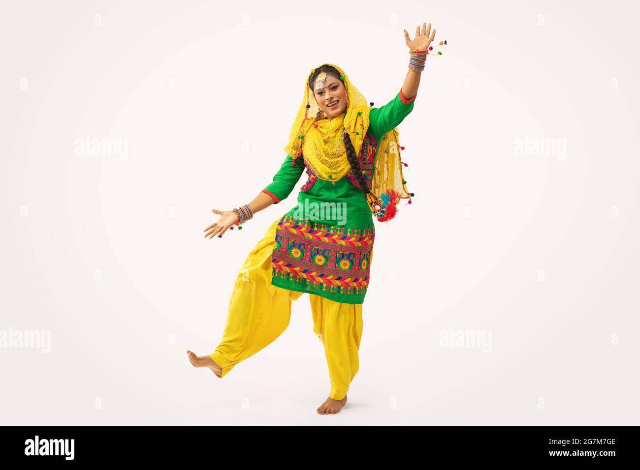 A Giddha dancer performing a dance step with hand gestures Stock Photo ...