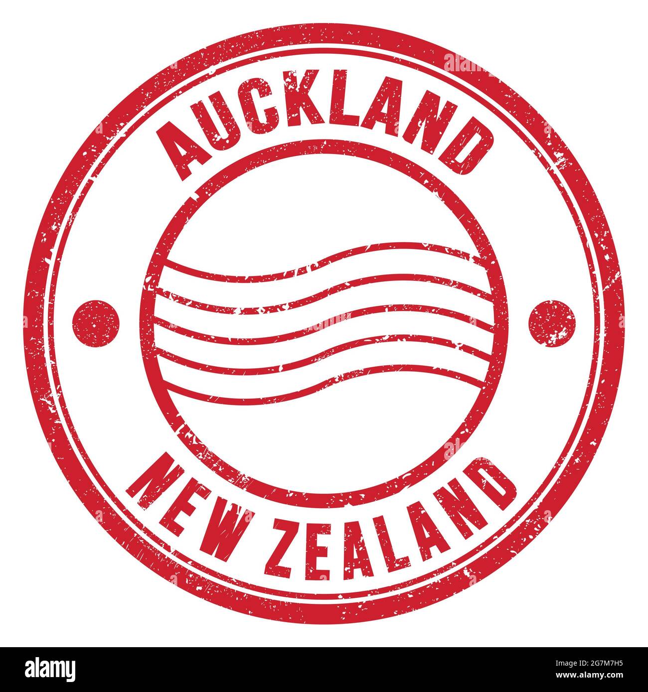AUCKLAND - NEW ZEALAND, words written on red round postal stamp Stock ...
