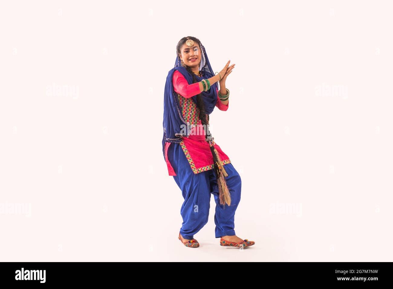 A Giddha Dancer performing a dance step Stock Photo - Alamy
