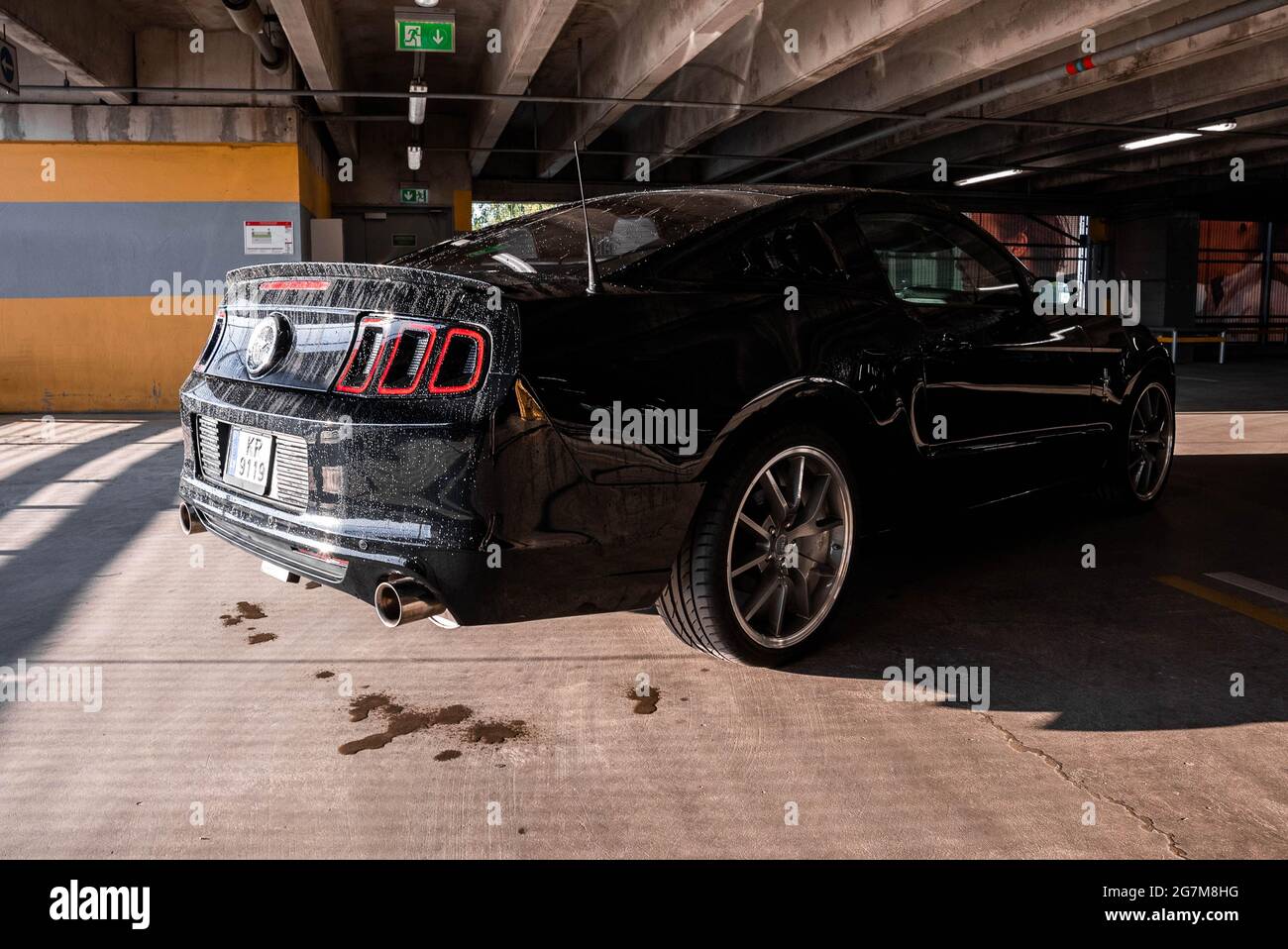Black Ford Mustang model parked. Sporty legendary American sportscar ...