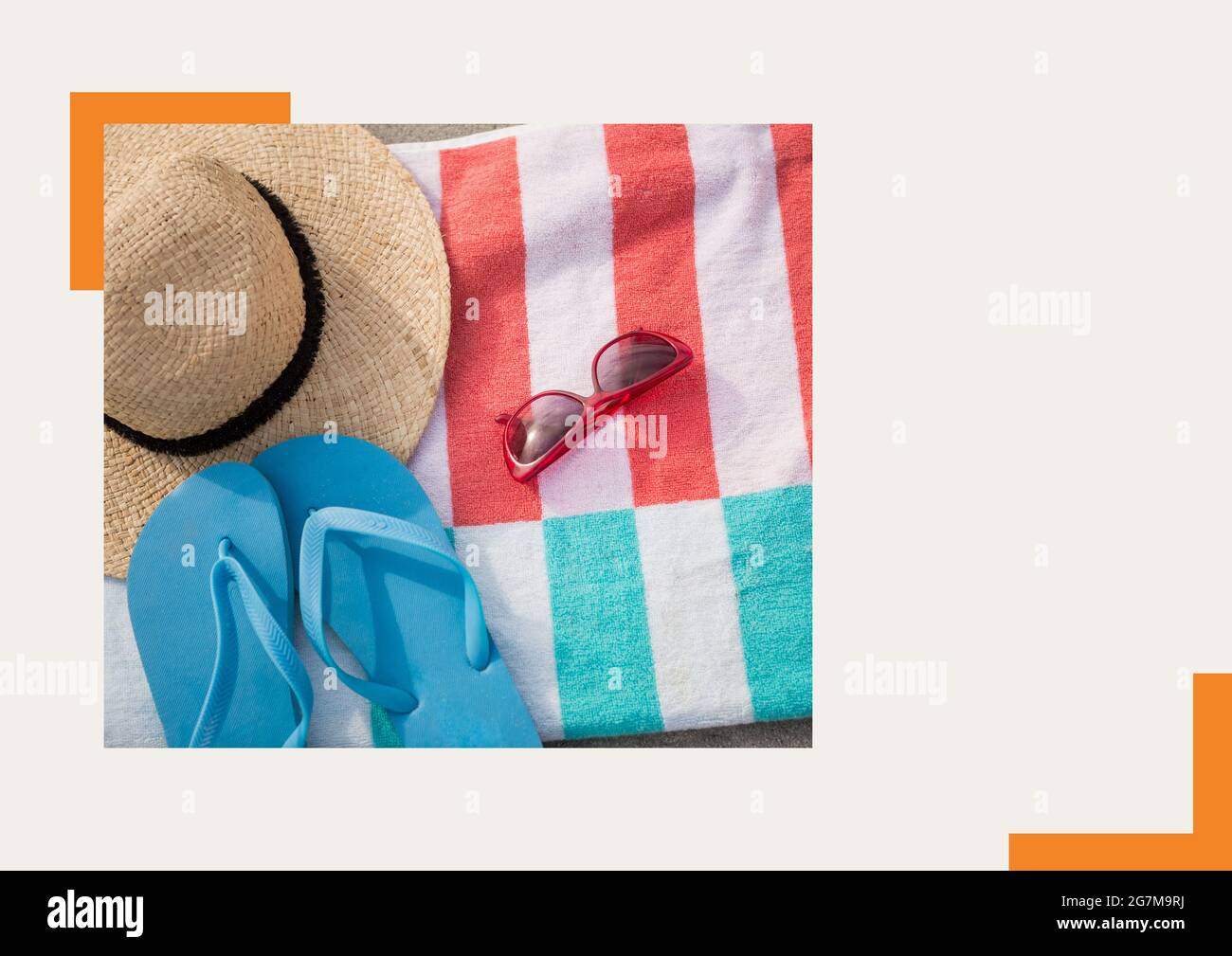Photograph of flip flops, sunglasses and starfish against grey ...