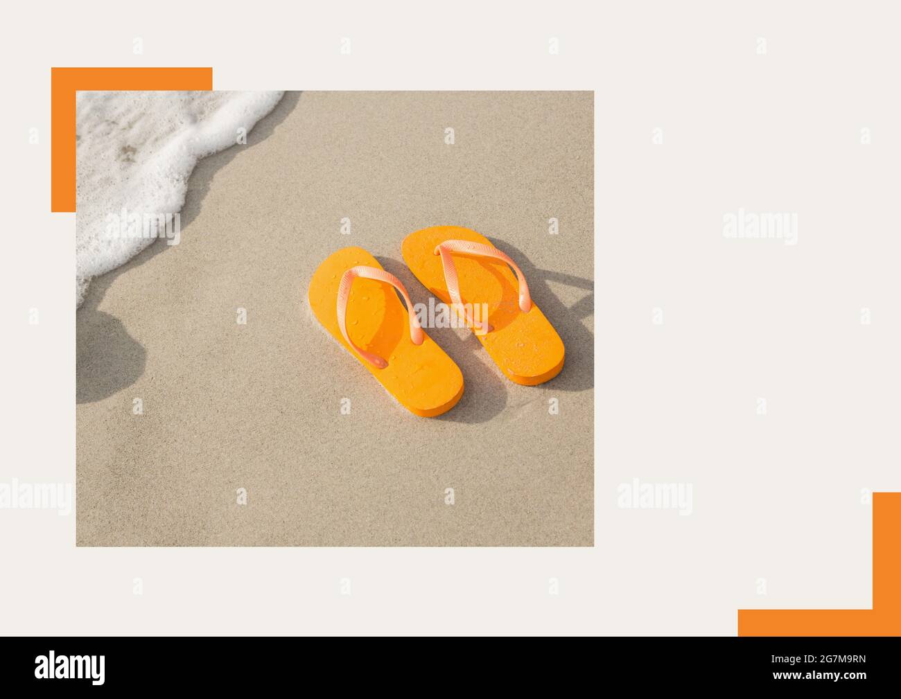 Photograph of orange flip flops at the beach against grey background ...