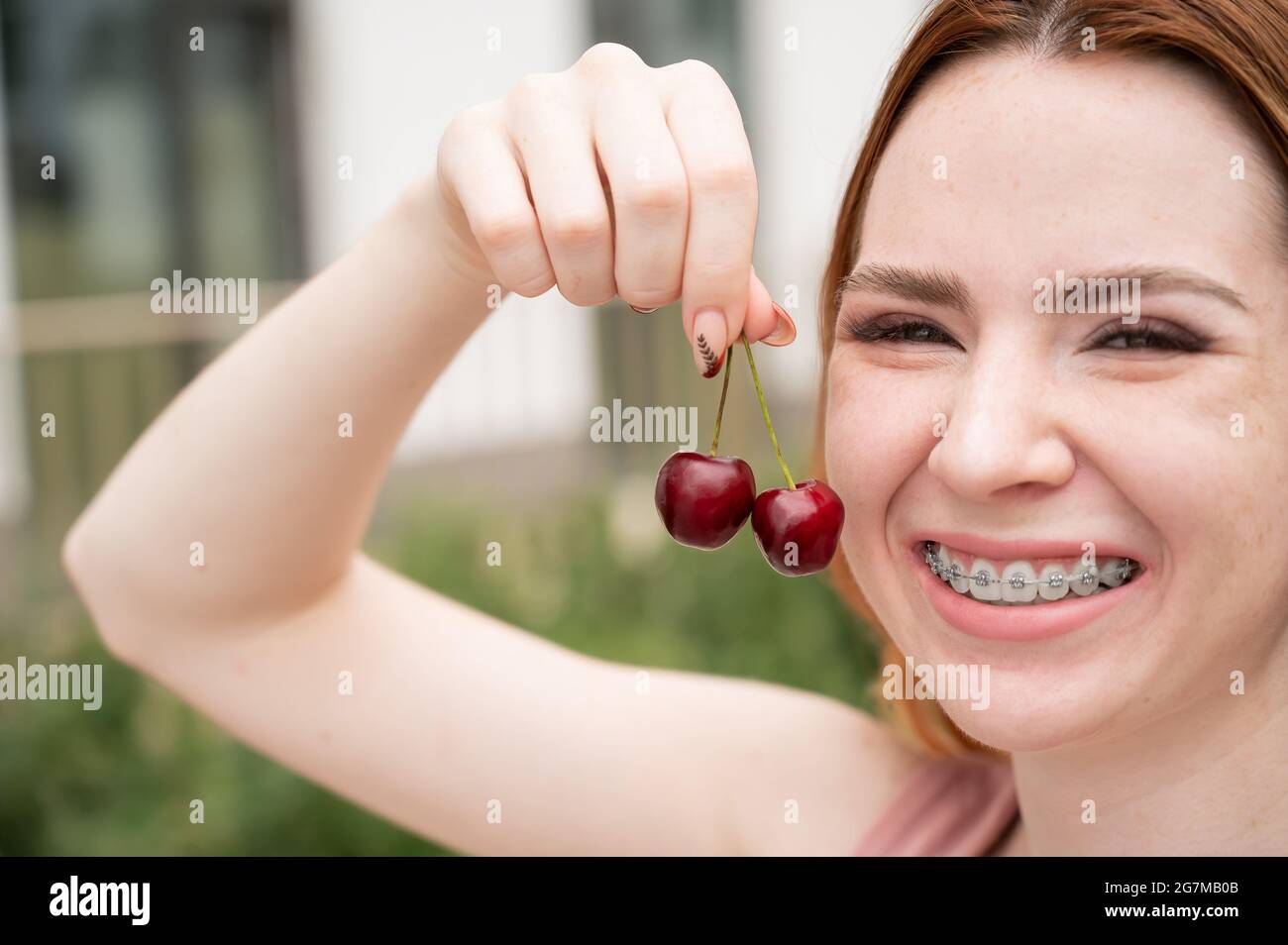 Pretty girl with braces and freckles hi-res stock photography and ...