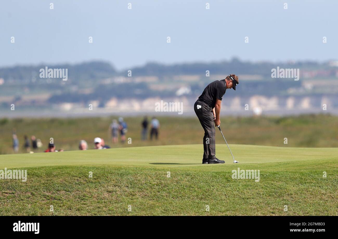 England's Ian Poulter putts on the 10th green during day one of The ...