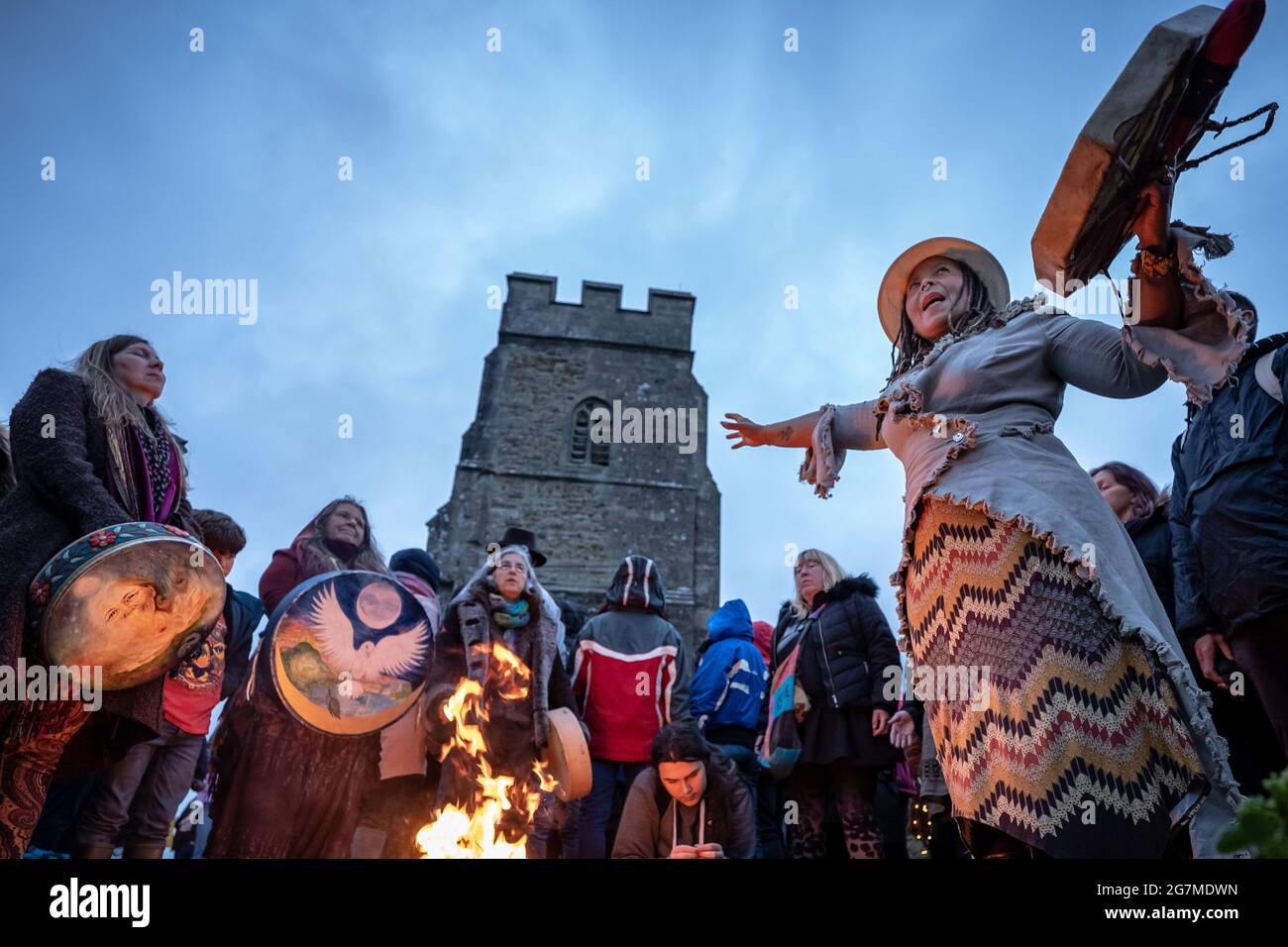 Summer Solstice celebrations on Glastonbury Tor with revellers ...