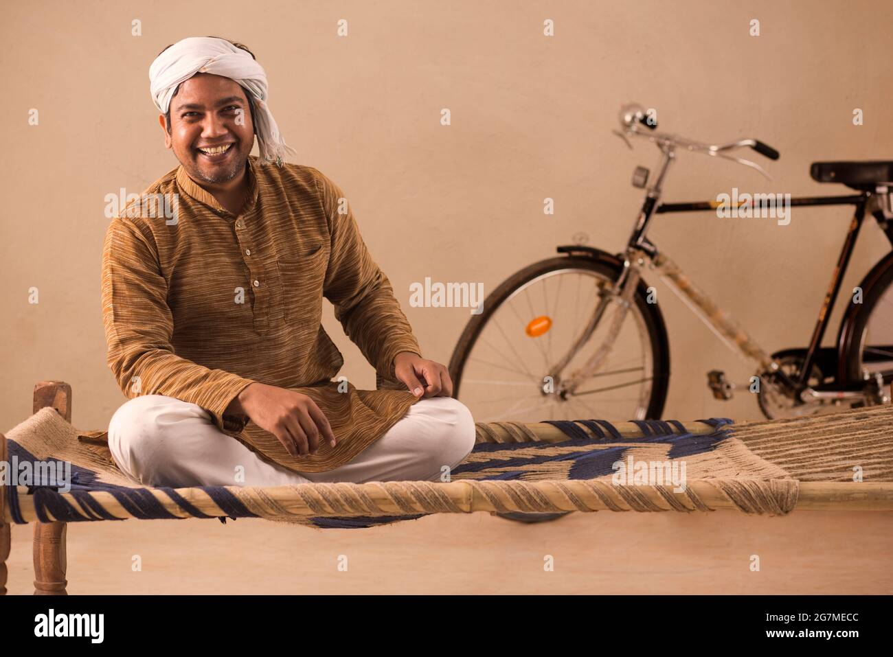 Sitting on a cot hi-res stock photography and images - Alamy