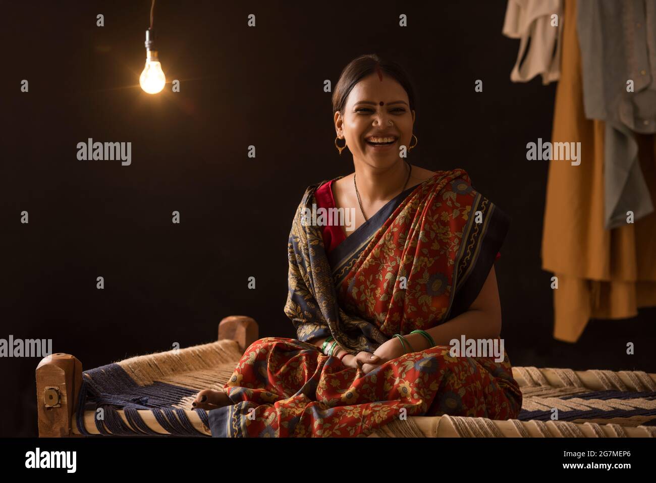 Indian rural villager woman sitting hi-res stock photography and images ...