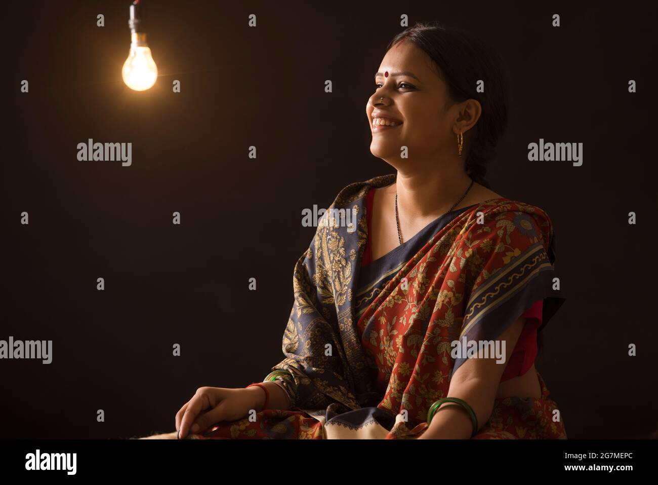 Indian rural villager woman sitting hi-res stock photography and images ...