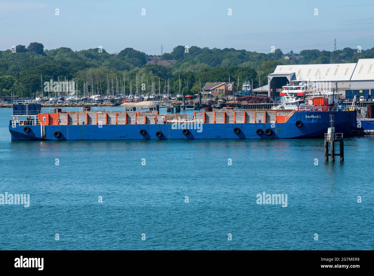Hythe, Hampshire, England, UK. 2013. Sea Rock 1 a deck cargo barge on ...