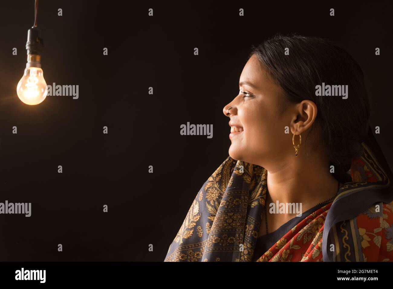 PORTRAIT OF A HAPPY RURAL WOMAN LOOKING BEHIND PORTRAIT OF A HAPPY ...