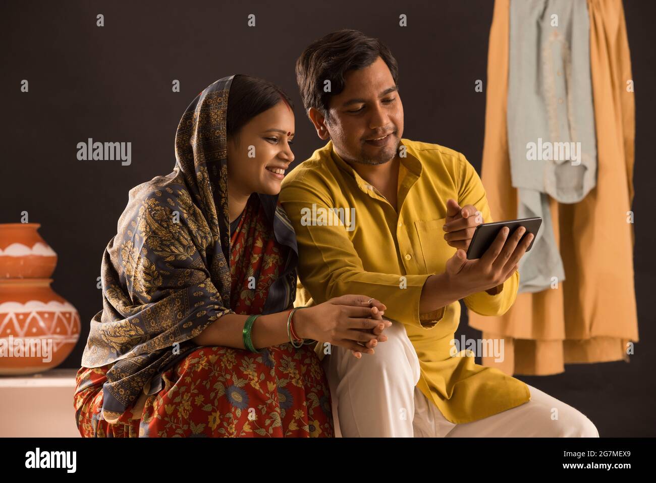 Rural village indian man using mobile phone hi-res stock photography ...