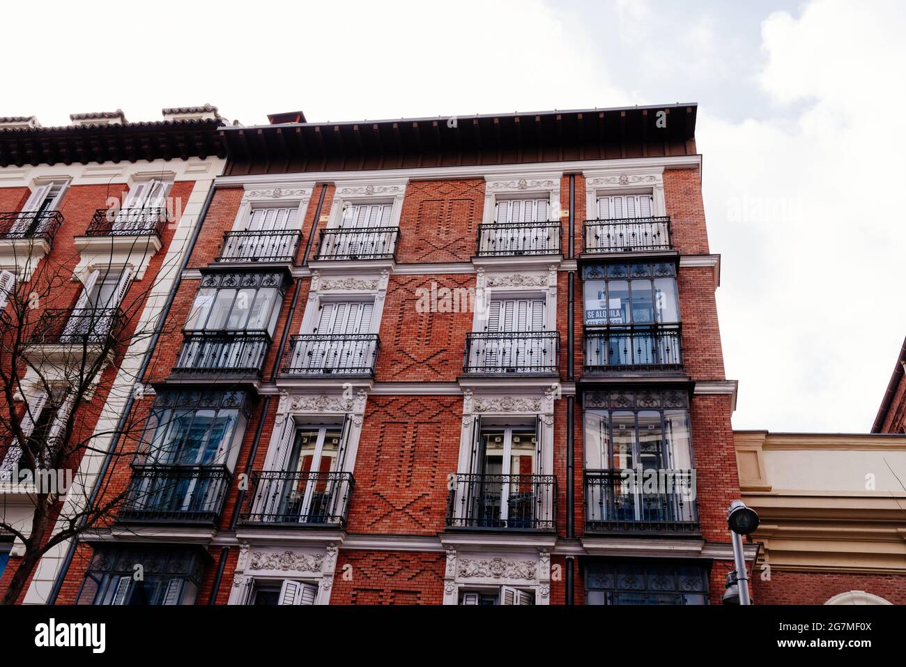 Madrid, Spain - March 7, 2021: Old luxury residential building with ...