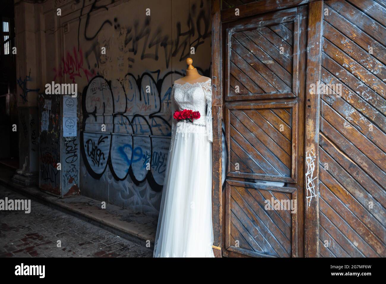 Advertising of a wedding dress shop. Mannequin in a wedding dress on ...