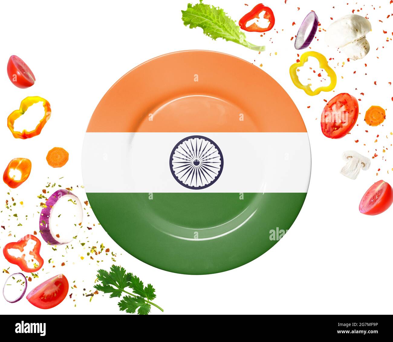 vegetables with painted flag of India on plate isolated on white ...