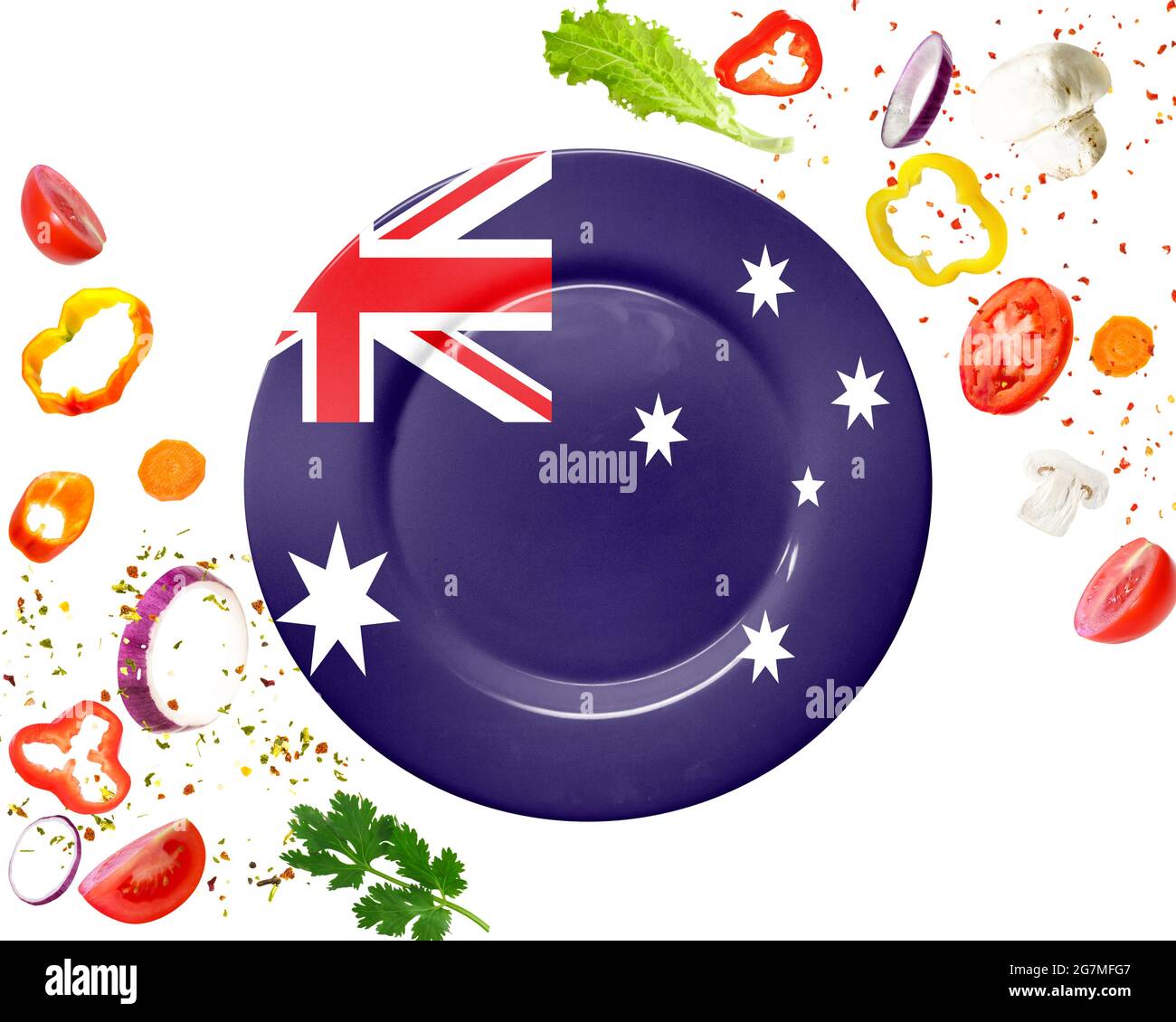 vegetables with painted flag of Australia on plate isolated on white ...