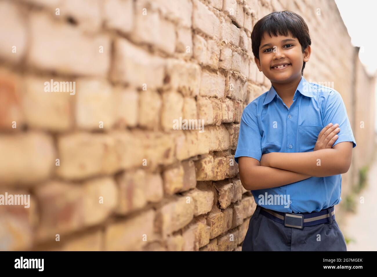 PORTRAIT OF A SMILING RURAL YOUNG BOY OUTSIDE Stock Photo - Alamy